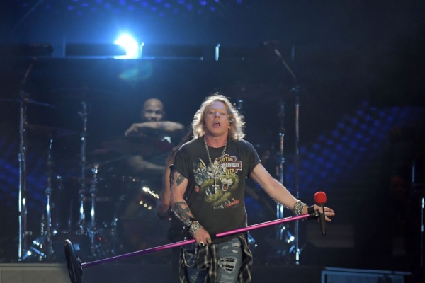 WATCH: Axl Rose Throw Mic At And Kick New Guns N'Roses Drummer Before ...